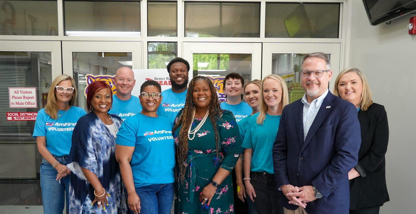 AmFirst Donates 700+ Books and Volunteers to Combat Childhood ...